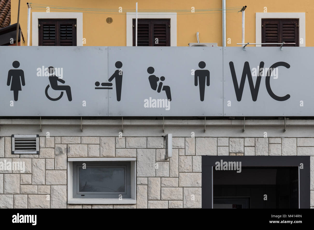 Public toilets wc restroom sign Stock Photo - Alamy