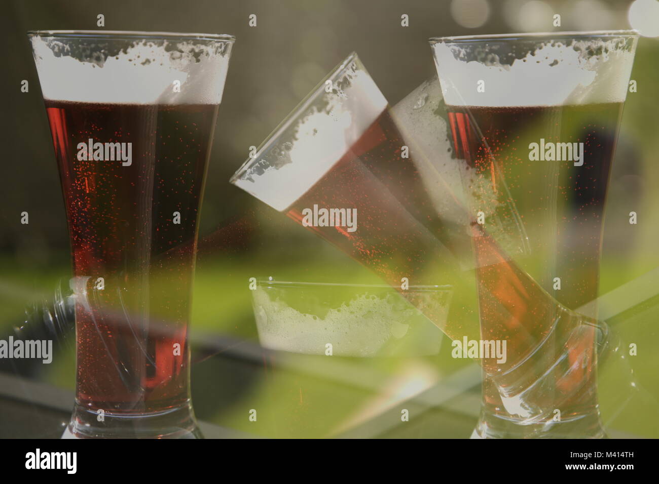 A glass of rose beer in double exposure Stock Photo - Alamy