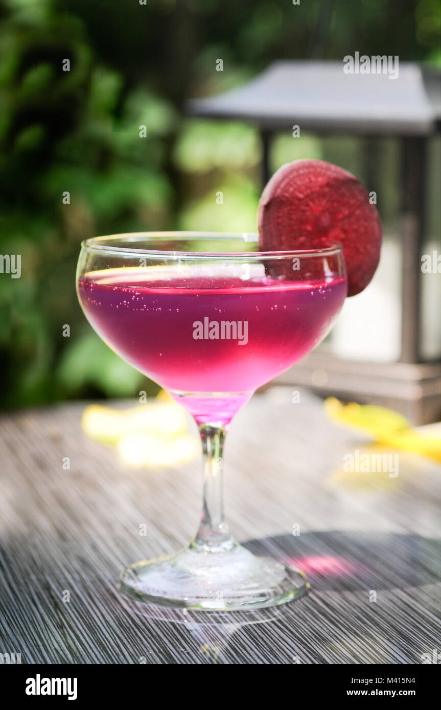 Beet kvass cocktail in a coupe glass Stock Photo - Alamy