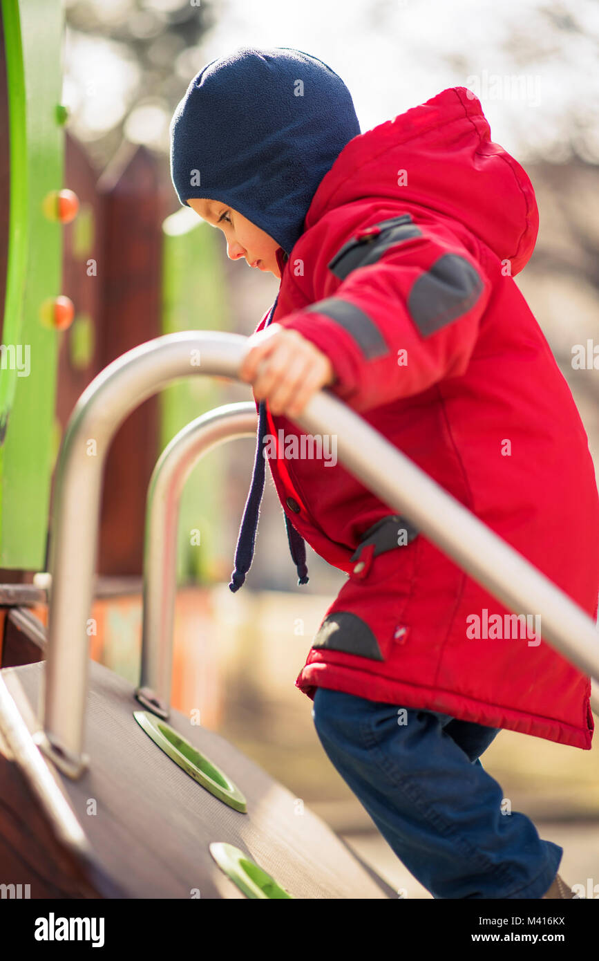 Little kid, caucasian boy, having fun in the park Stock Photo - Alamy
