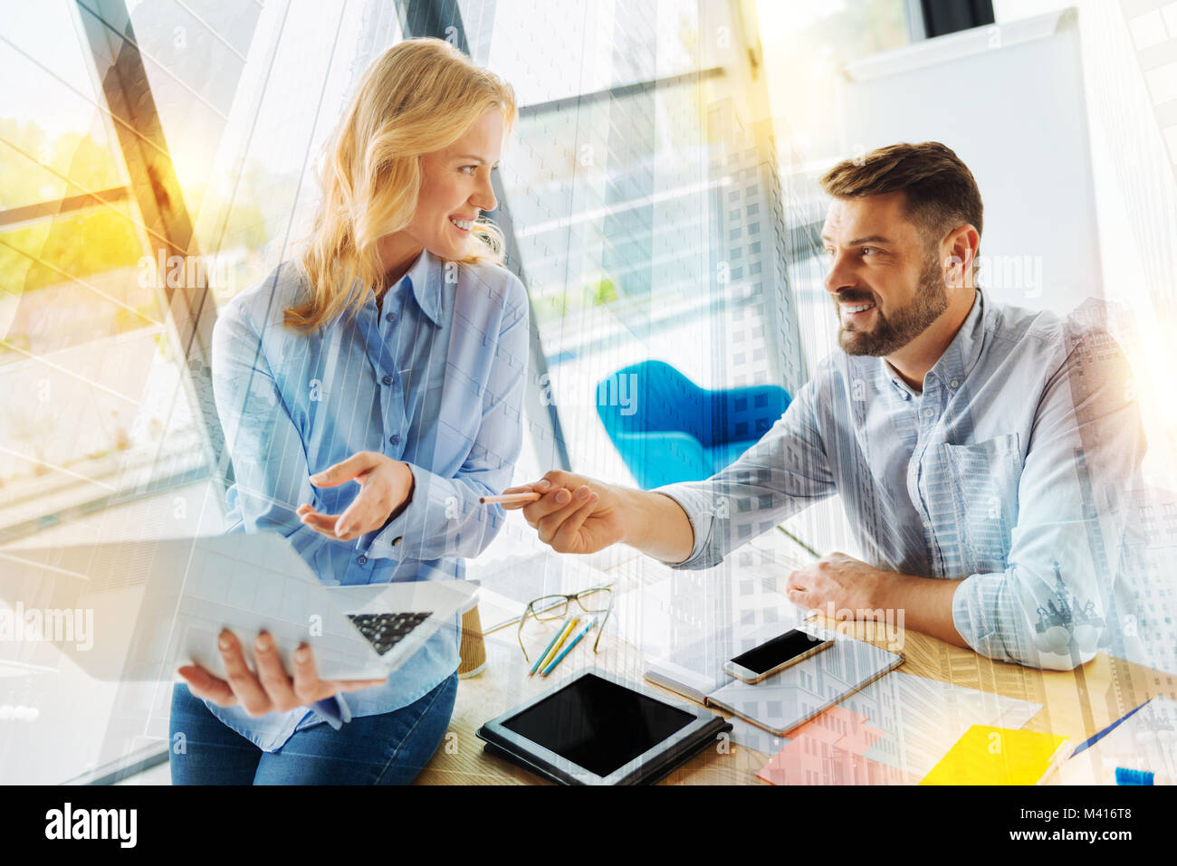 Friendly coworkers hi-res stock photography and images - Alamy