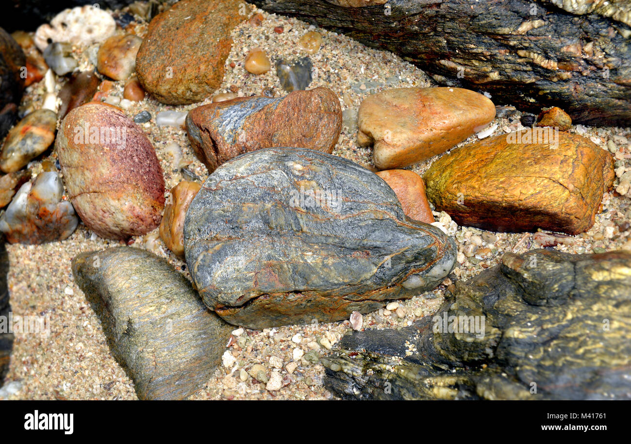 colorful tropical beach natural ocean gravel and sand rock Stock Photo ...