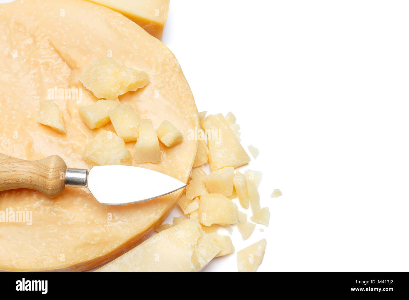 Whole round Head and pieces of parmesan or parmigiano hard cheese Stock ...