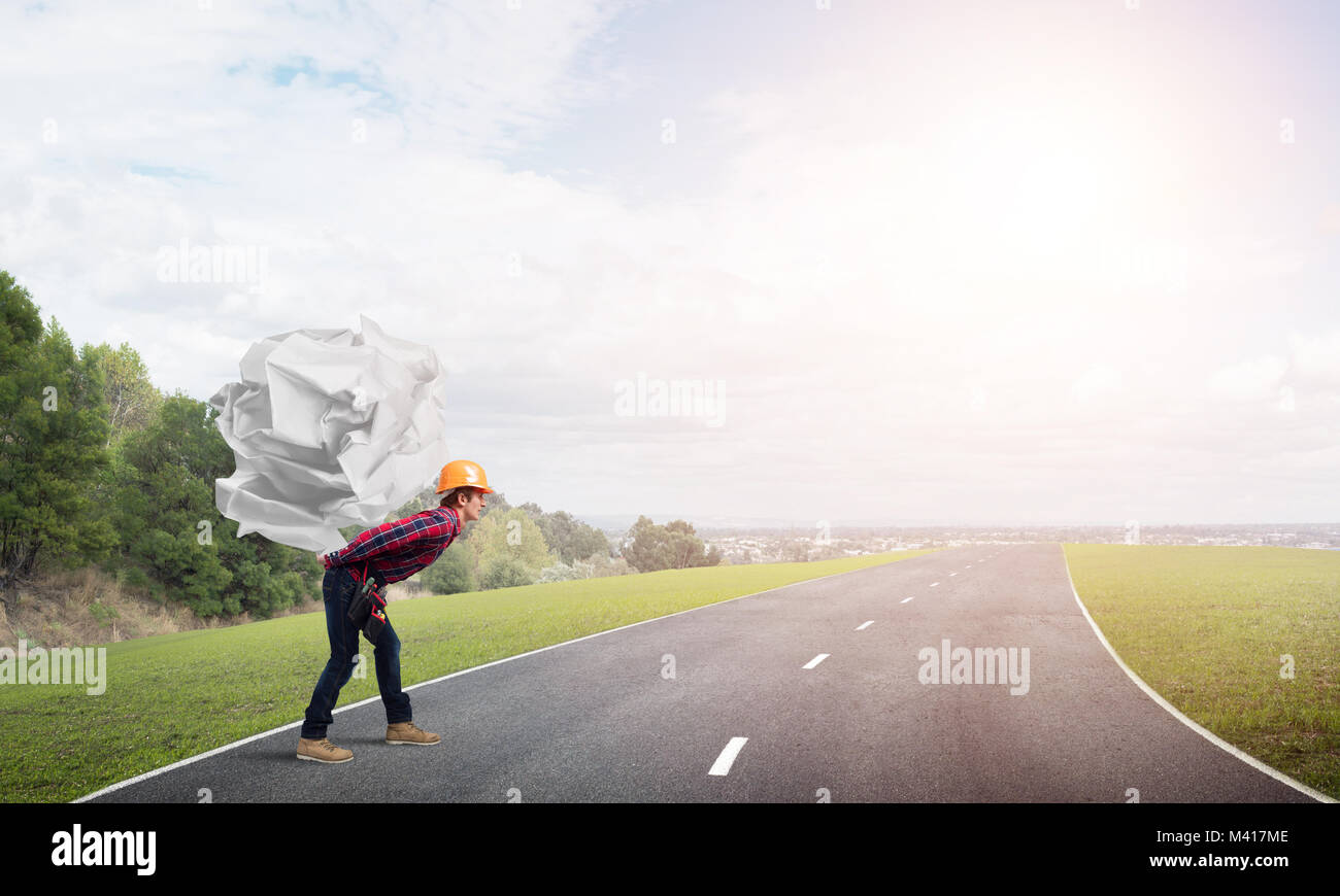Engineer man carry load Stock Photo - Alamy