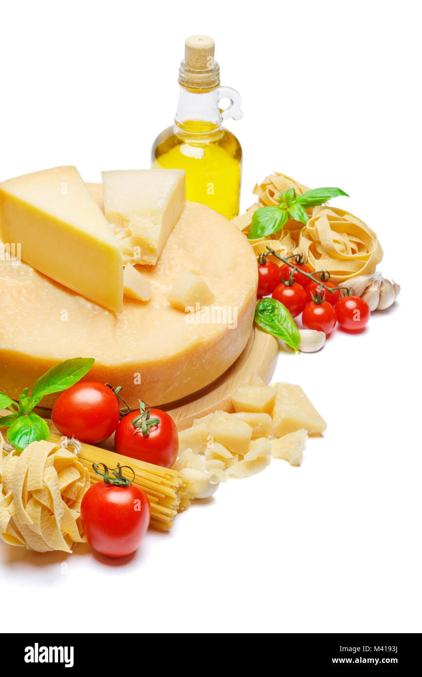 Traditional Italian parmesan or parmigiano cheese, pasta, tomatoes and ...