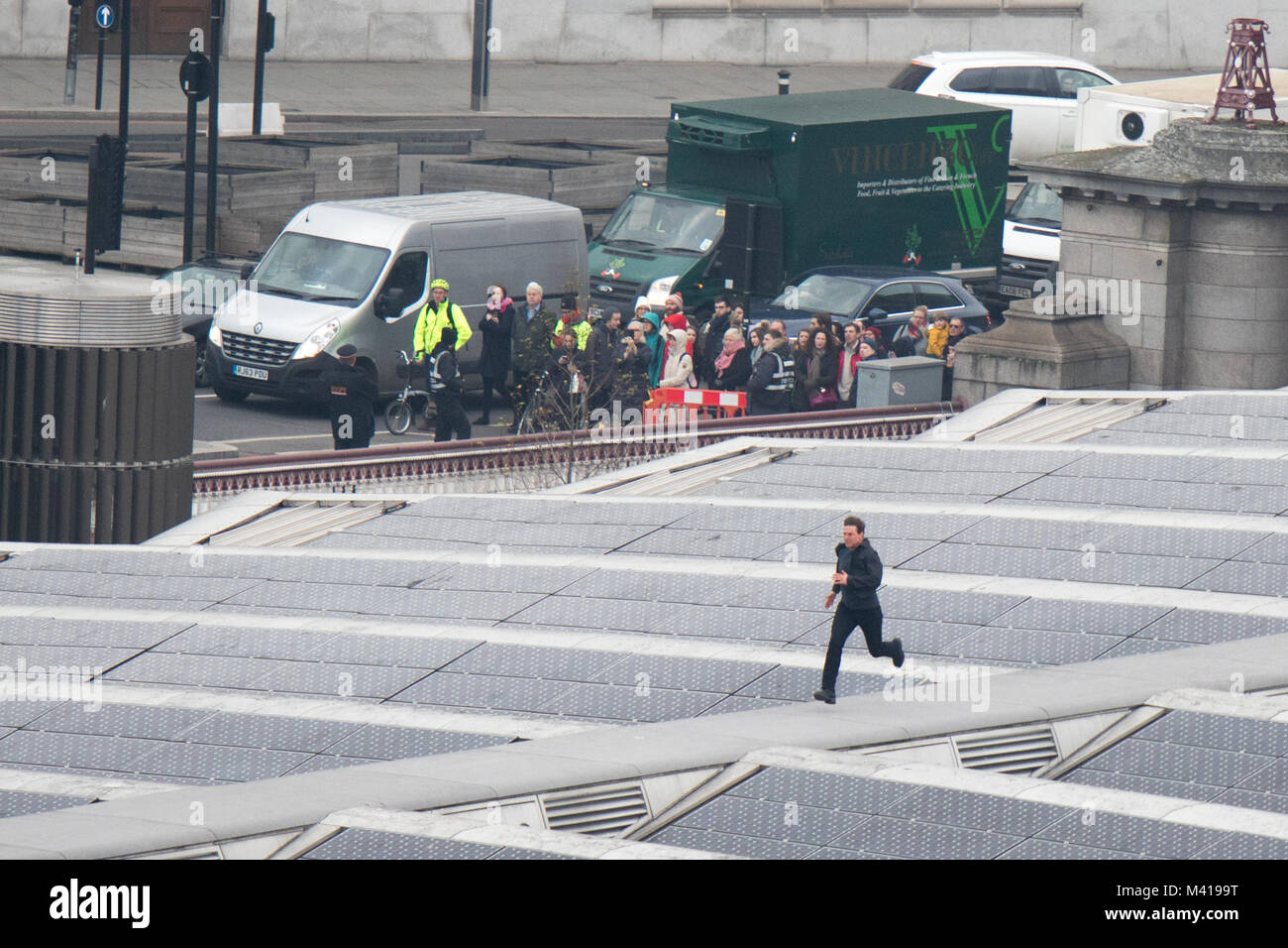 Helicopters fly low on Blackfriars bridge for the filming 'Mission ...