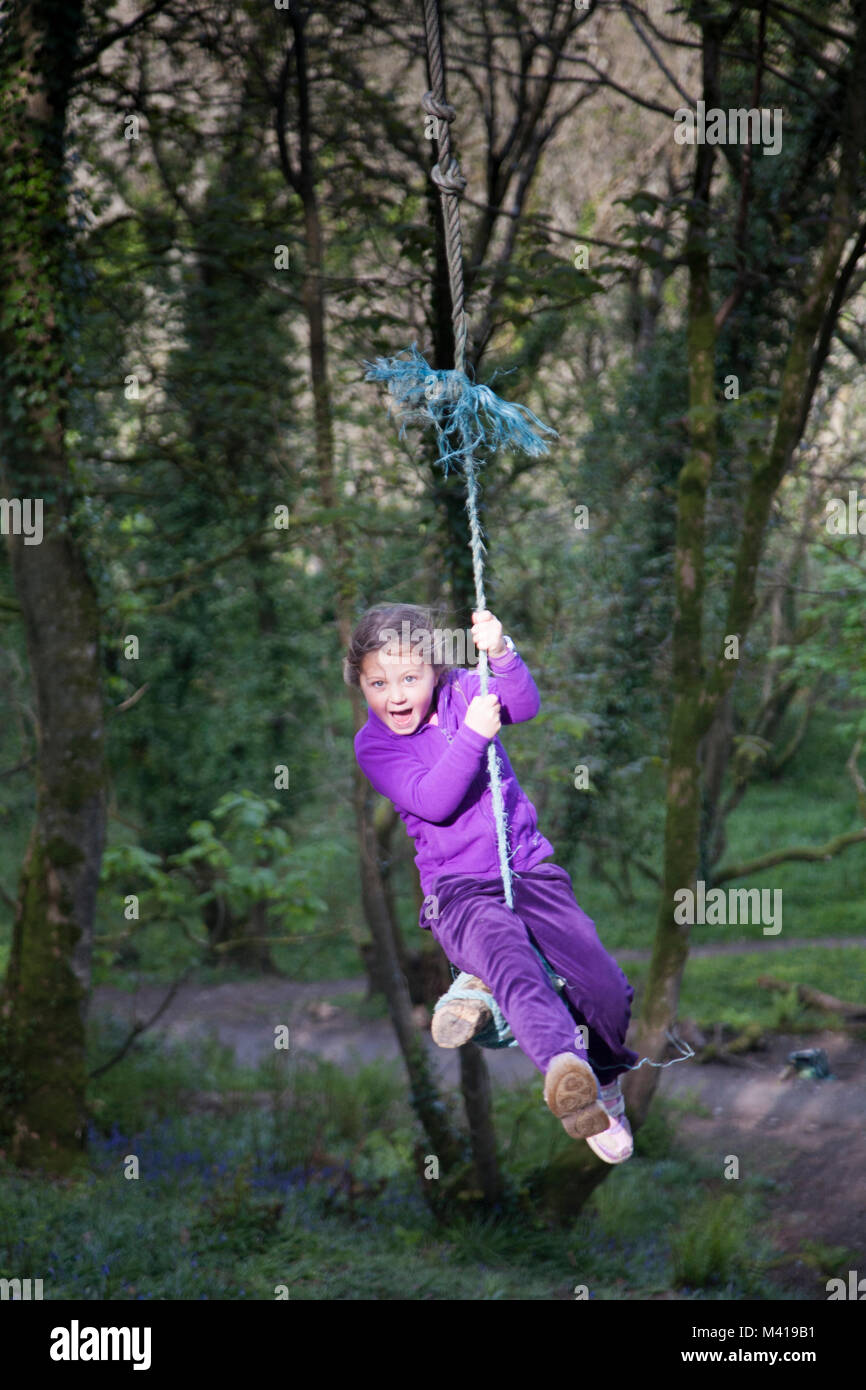 Child on rope hi-res stock photography and images - Alamy