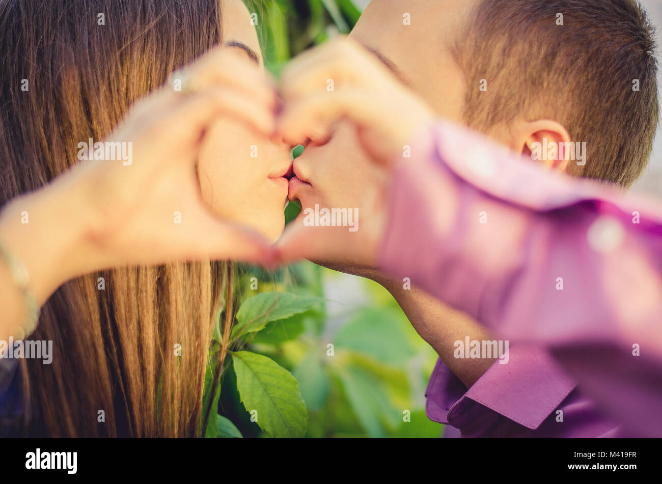 Making heart with arms hi-res stock photography and images - Alamy