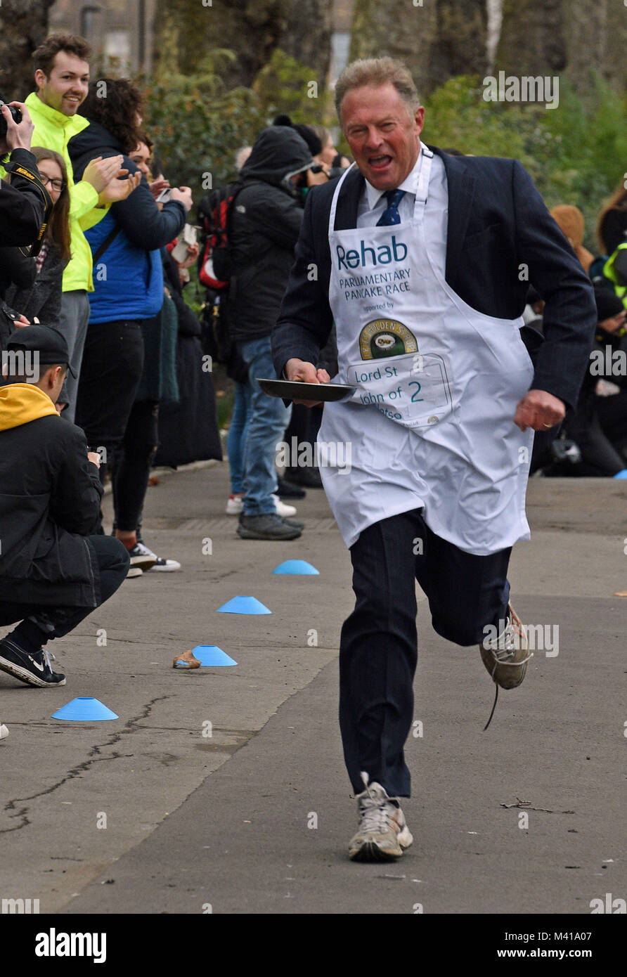 Lord St John of Bletso taking part in the Parliamentary Pancake Race in ...