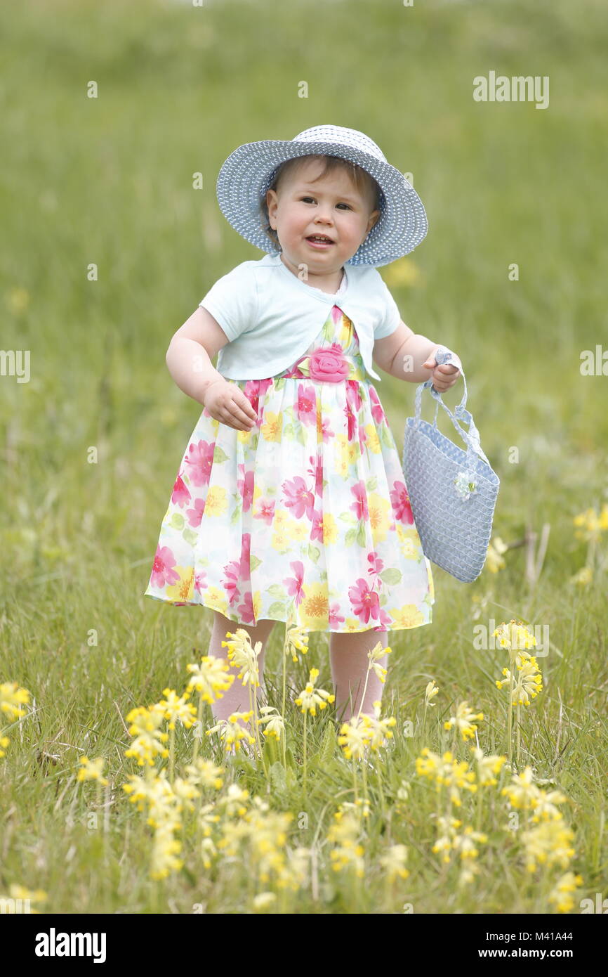 Ivy Mitchell enjoys the Easter weather as she runs around the meadow ...