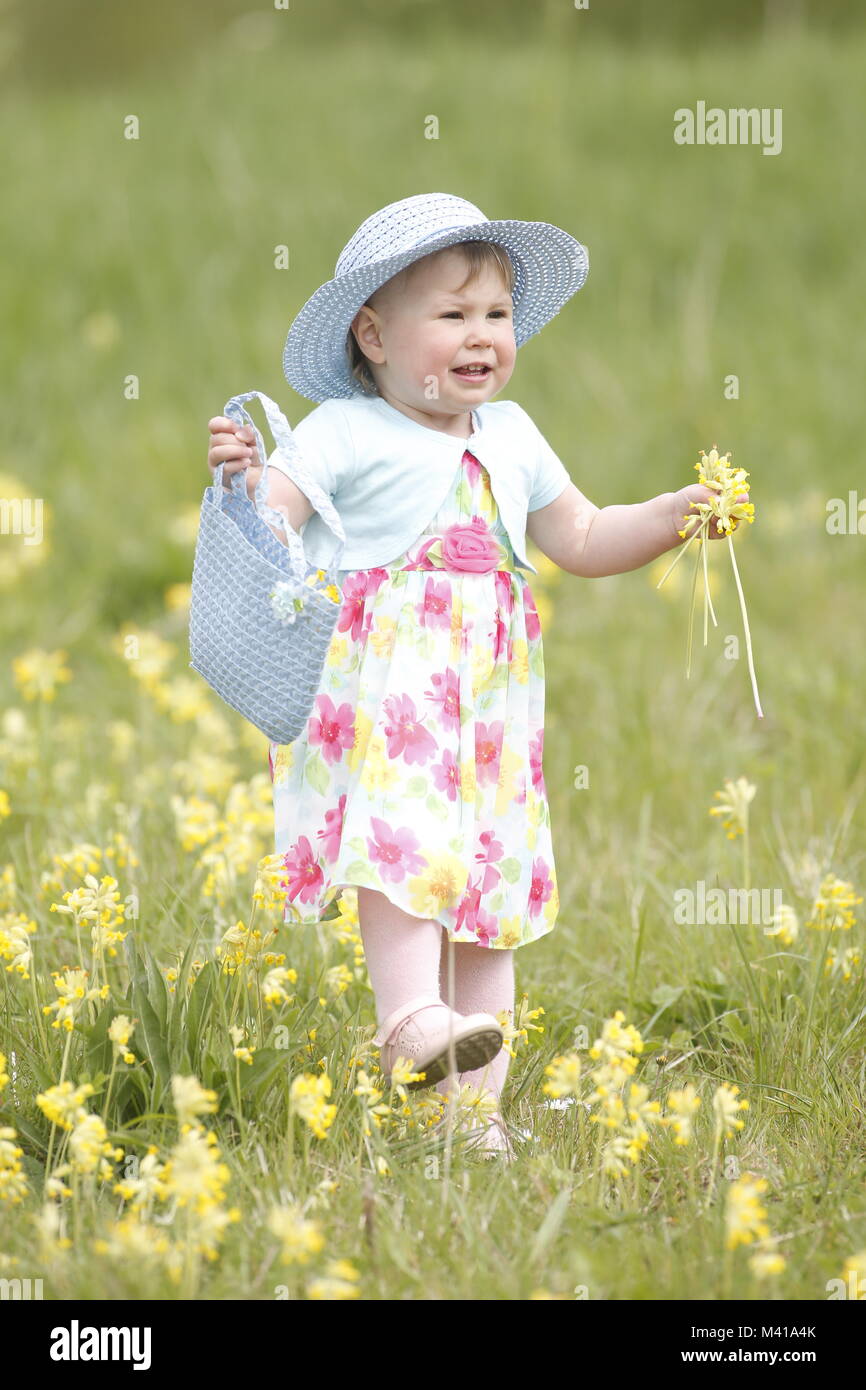 Ivy Mitchell enjoys the Easter weather as she runs around the meadow ...