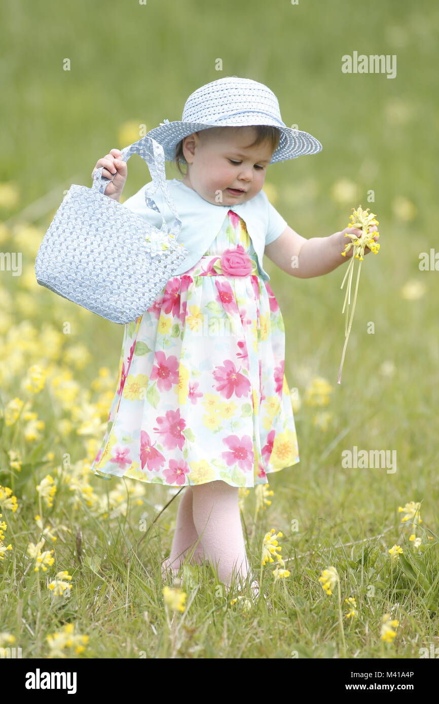 Ivy Mitchell enjoys the Easter weather as she runs around the meadow ...
