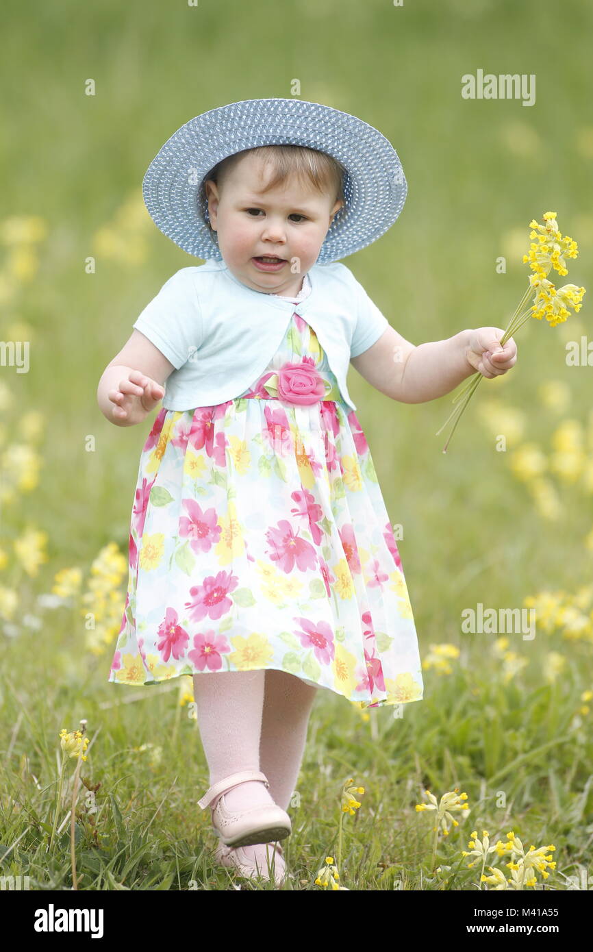 Ivy Mitchell enjoys the Easter weather as she runs around the meadow ...