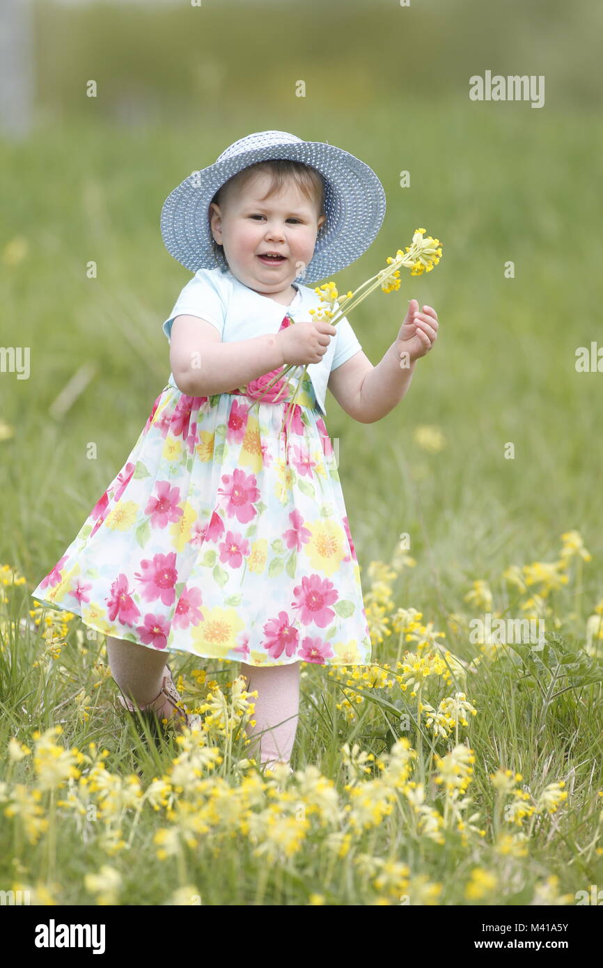 Ivy Mitchell enjoys the Easter weather as she runs around the meadow ...