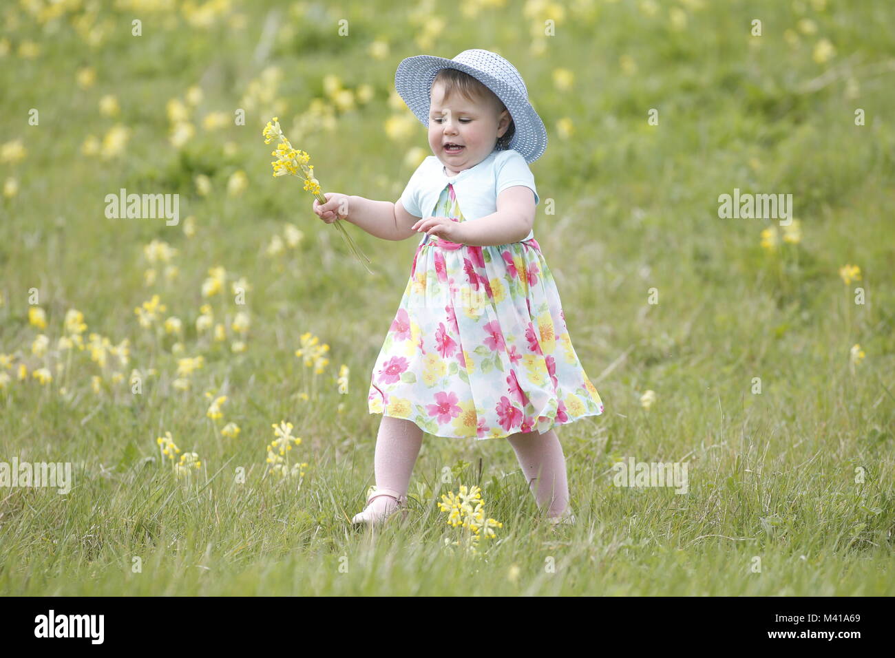Ivy Mitchell enjoys the Easter weather as she runs around the meadow ...