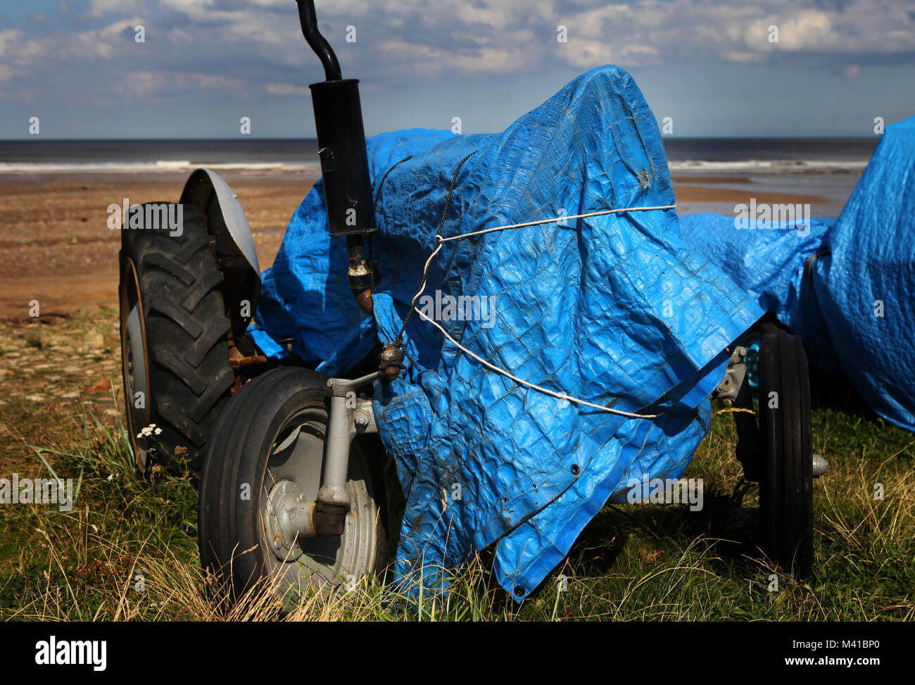 Sea-going tractors wrapped up against the elements in Saltburn-by-the ...