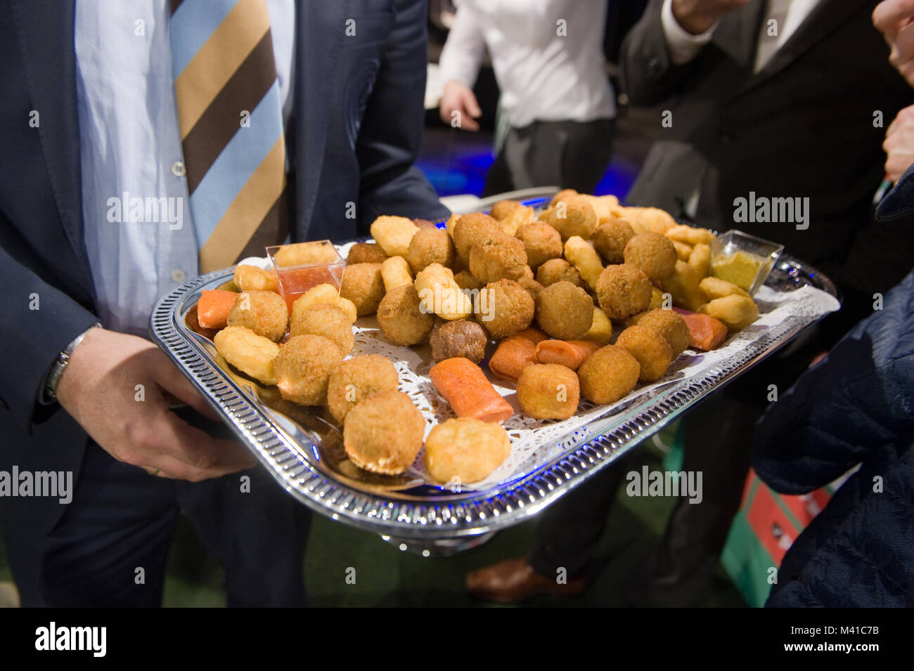 Several greasy snacks served on a plate Stock Photo - Alamy