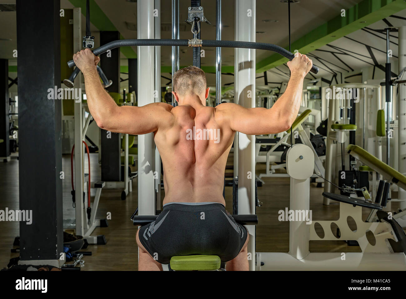 Shoulder pull down exercise Stock Photo - Alamy