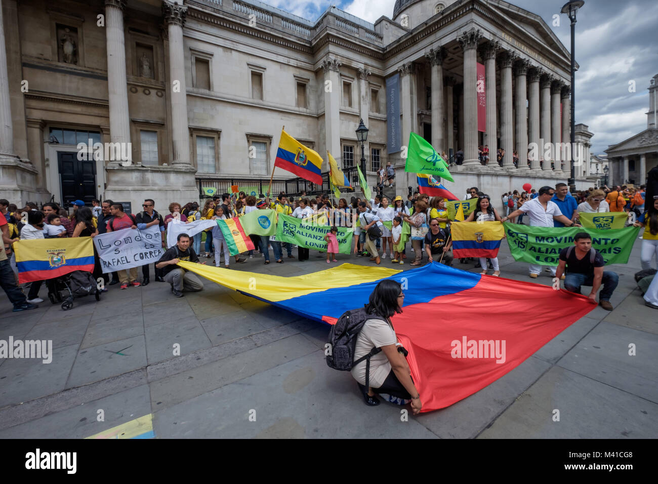 Ecuadorians prepare to pose for a photograph in Trafalgar Square at ...