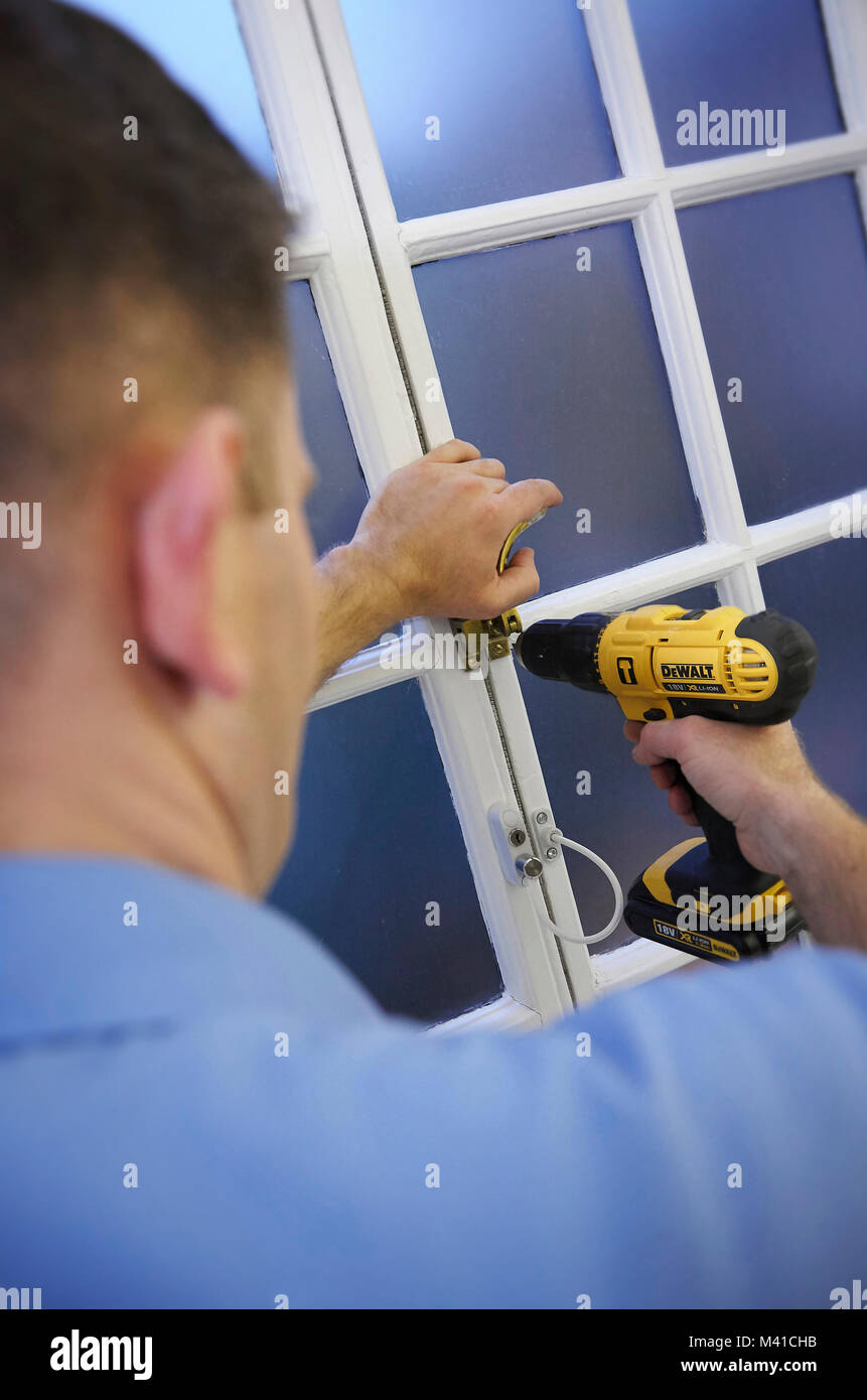 Installing window hi-res stock photography and images - Alamy