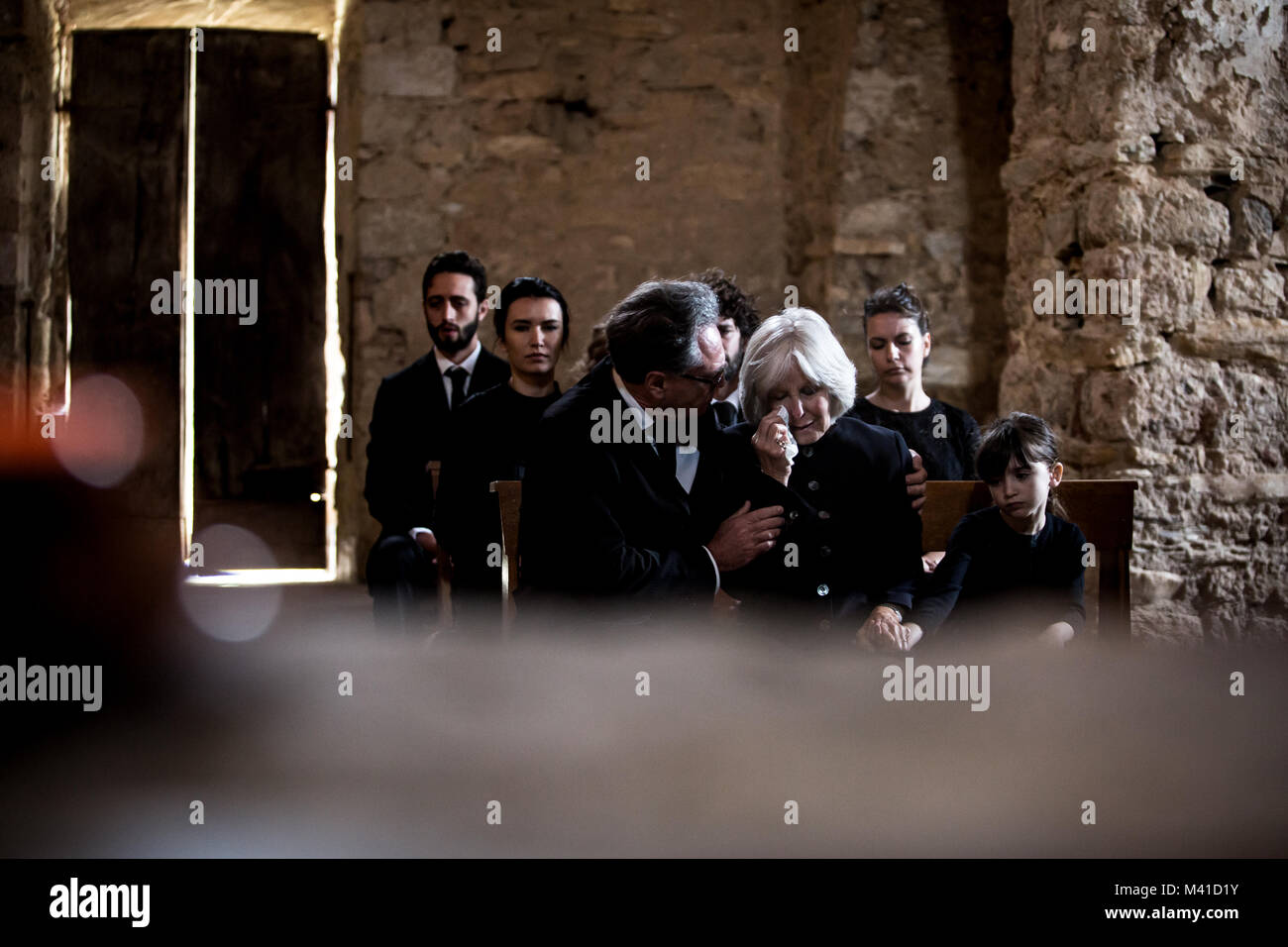 Group people mourning funeral young hi-res stock photography and images ...