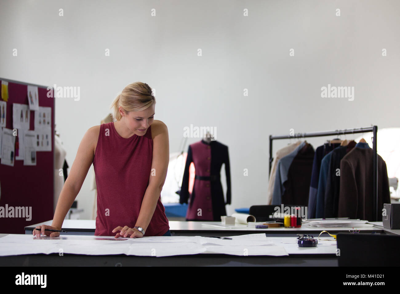Fashion designer working on a pattern Stock Photo - Alamy