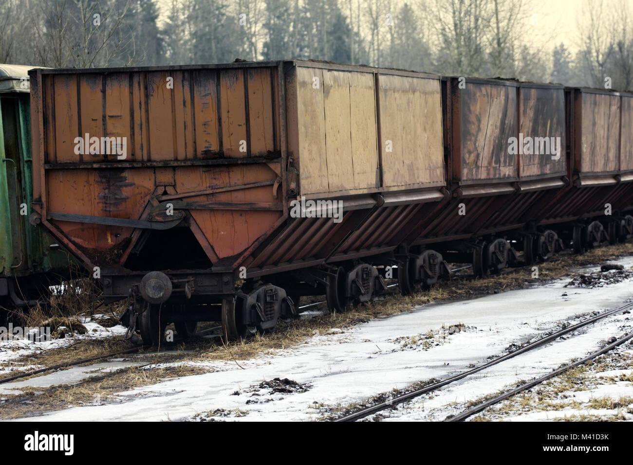 vintage cars in winter on a working railway. mining trains narrow-gauge ...