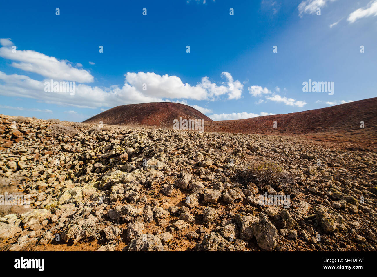 Amazing vulcanic landscape with mountains. Sky is blue with clouds ...