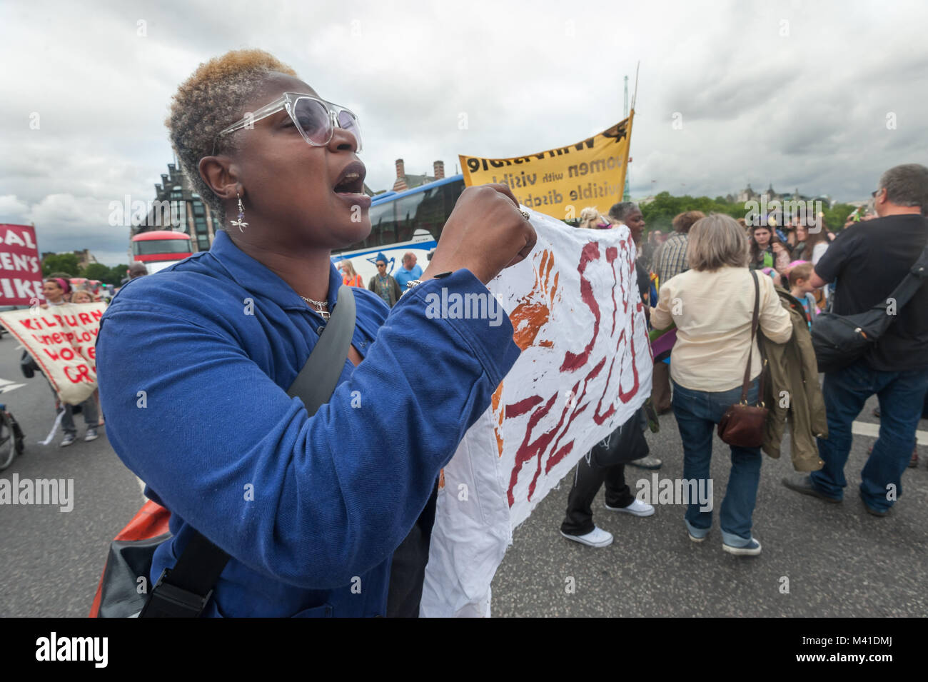 Disabled People Against the Cuts block traffic on Westminster Bridge on ...