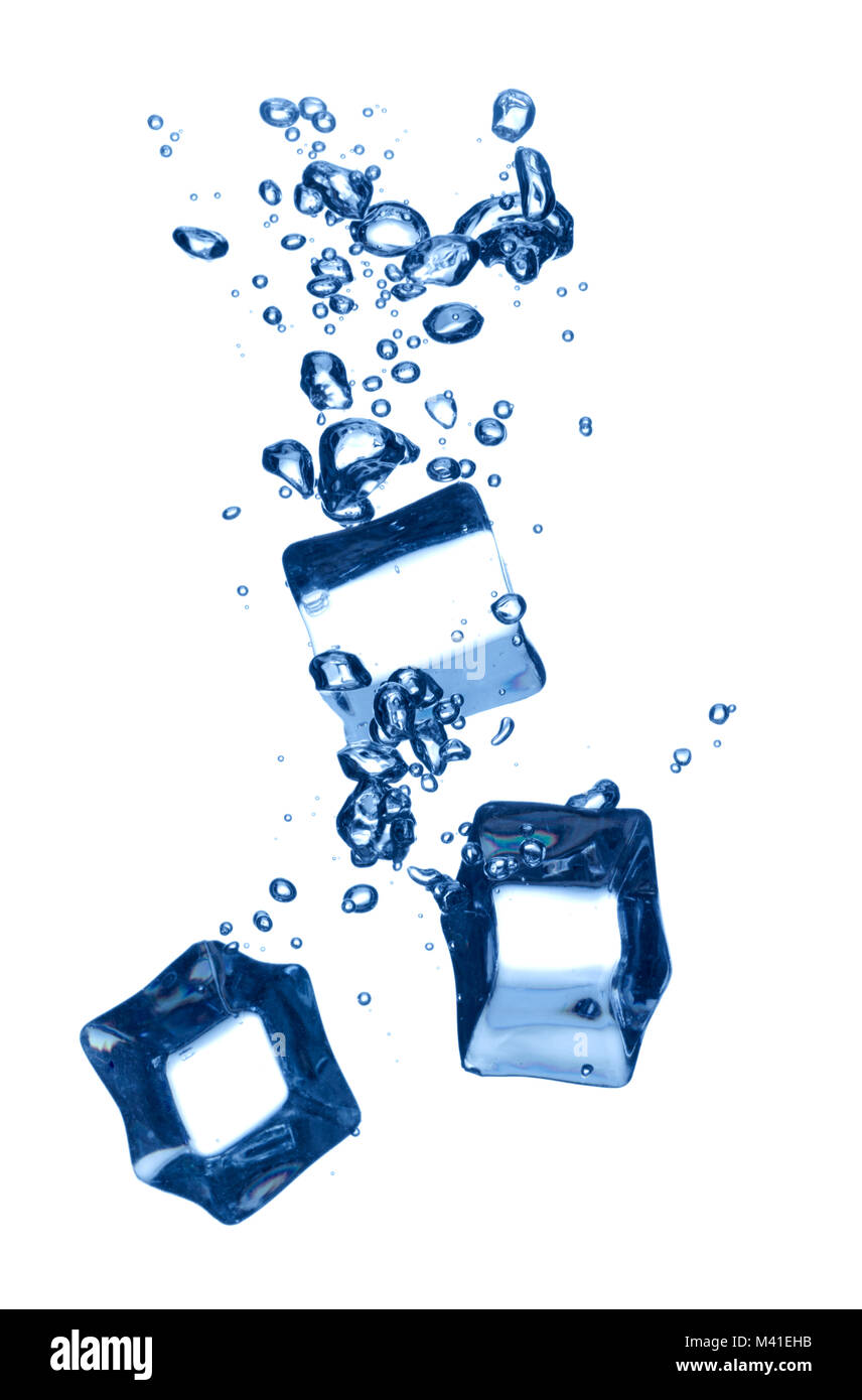 close up of ice cube splash in water on white background Stock Photo ...