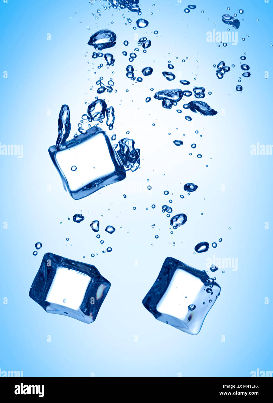 close up of ice cube splash in water on white background Stock Photo ...
