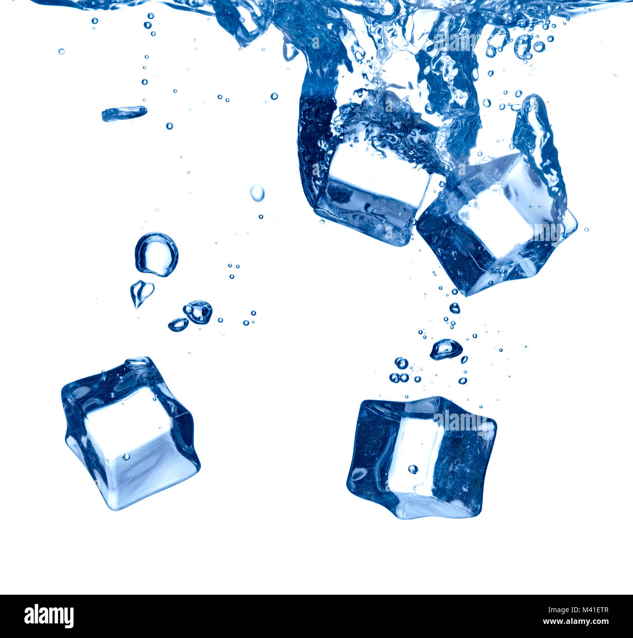 close up of ice cube splash in water on white background Stock Photo - Alamy