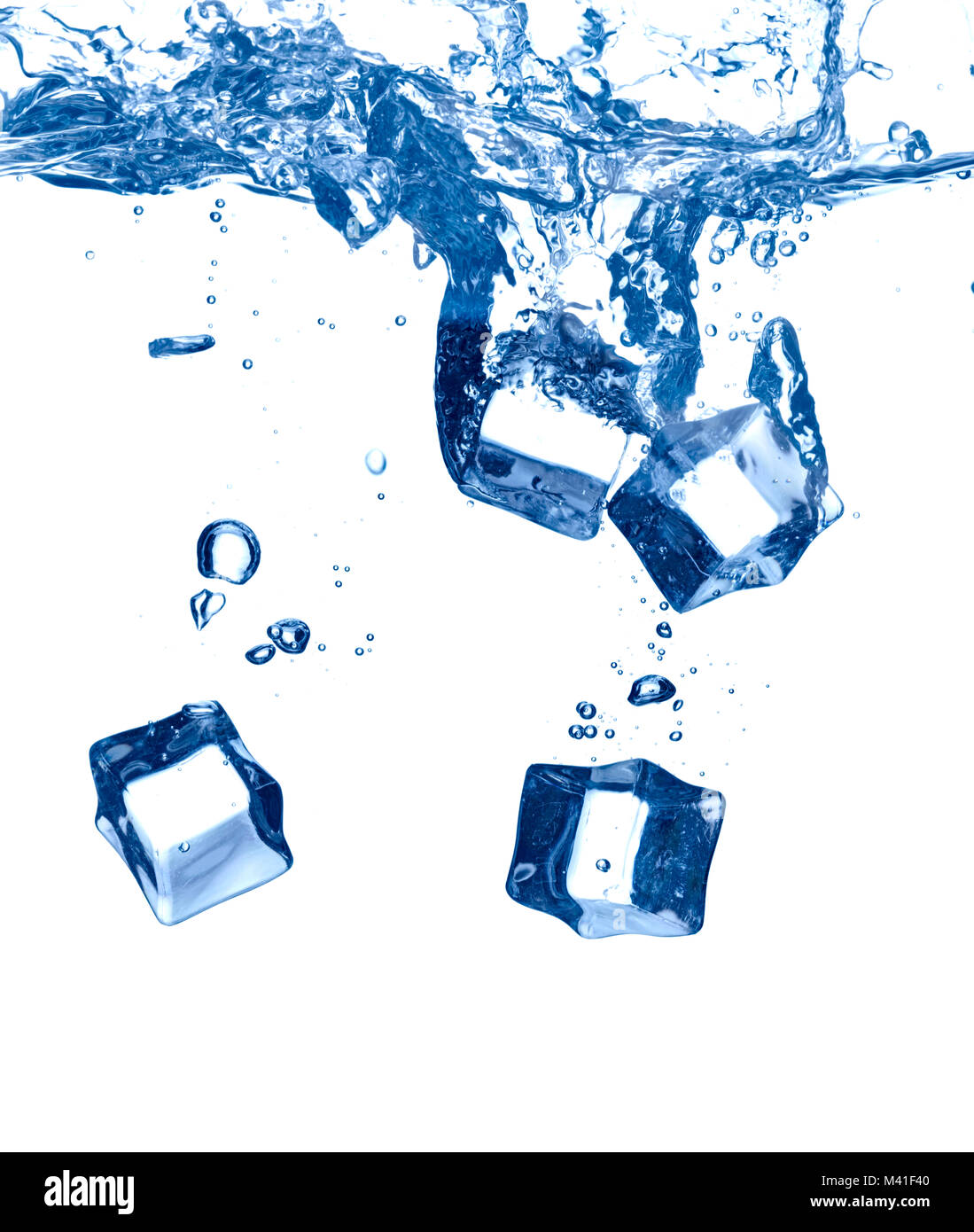 close up of ice cube splash in water on white background Stock Photo - Alamy