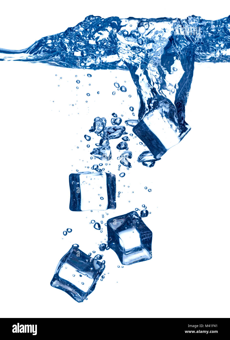 close up of ice cube splash in water on white background Stock Photo ...