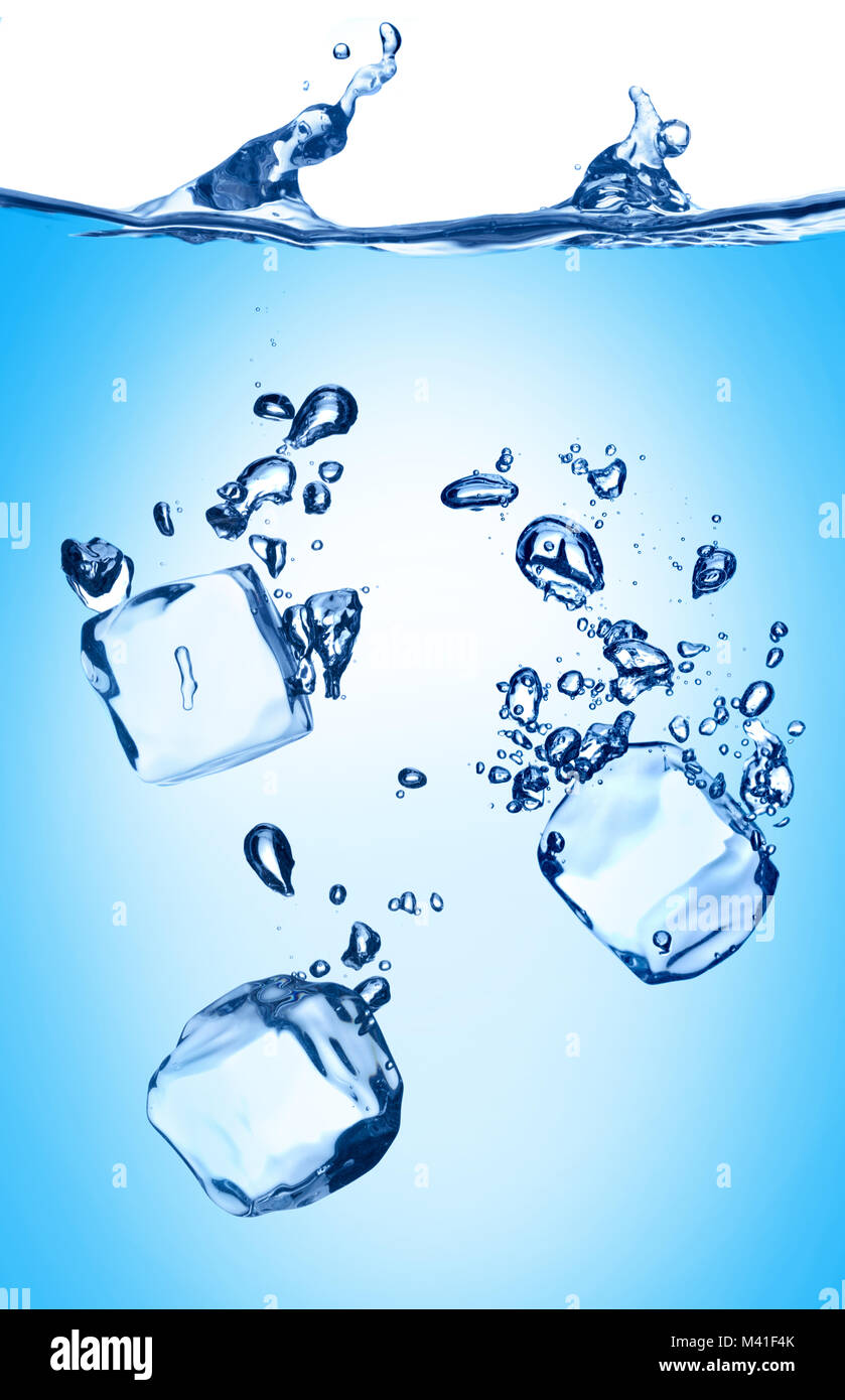 close up of ice cube splash in water on white background Stock Photo ...