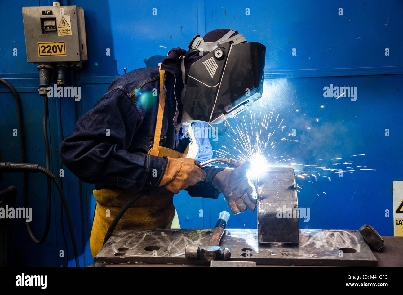 Welding a metal structure Stock Photo - Alamy