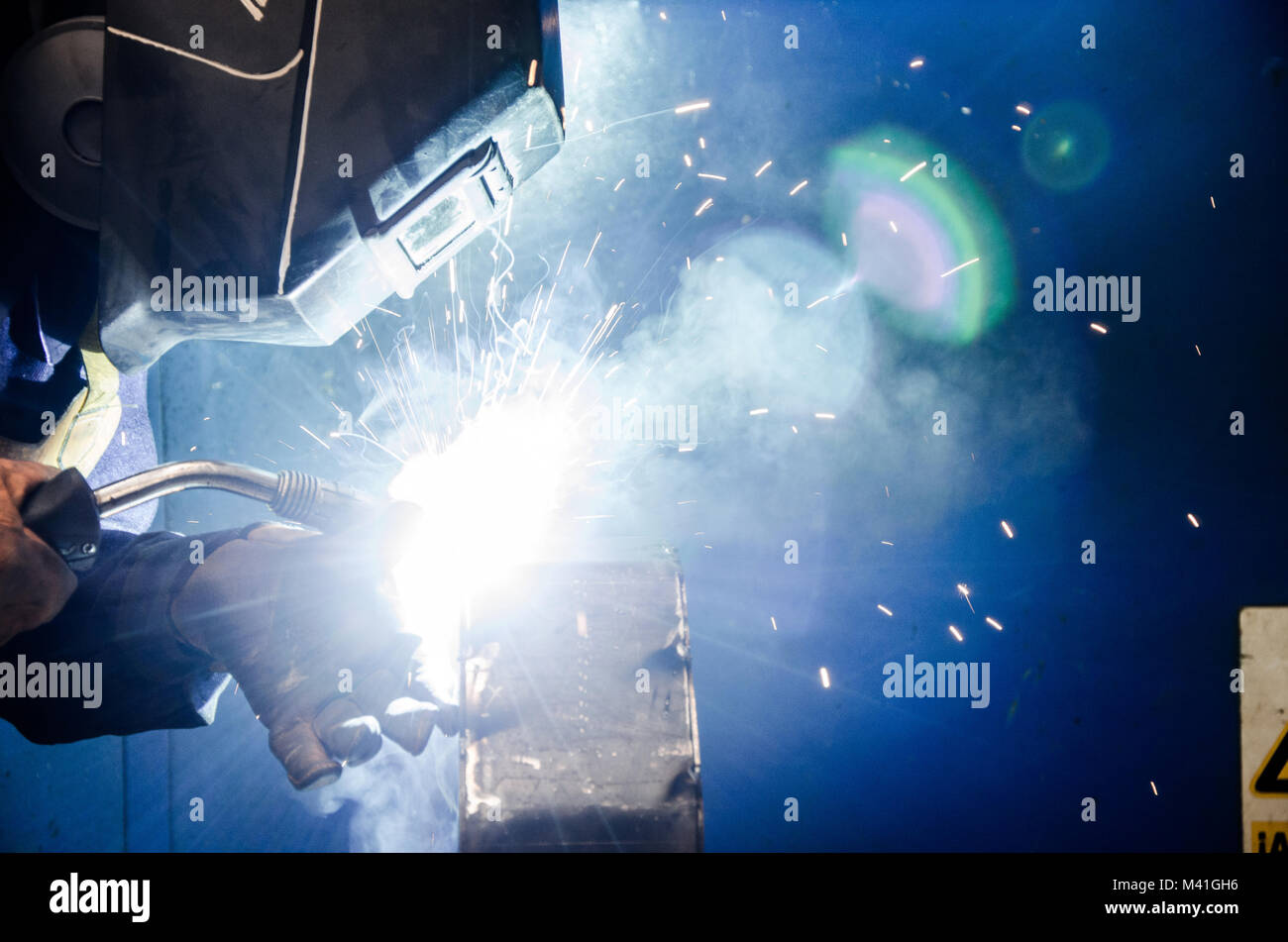 Welding a metal structure Stock Photo - Alamy