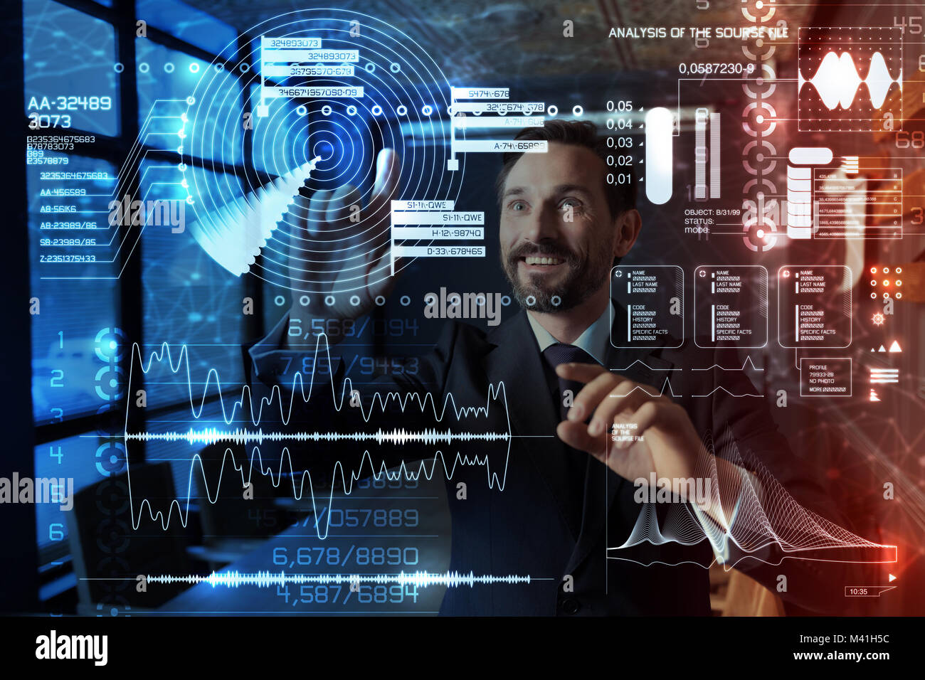 Emotional programmer feeling delighted while touching a futuristic ... Emotional programmer feeling delighted while touching a futuristic ...