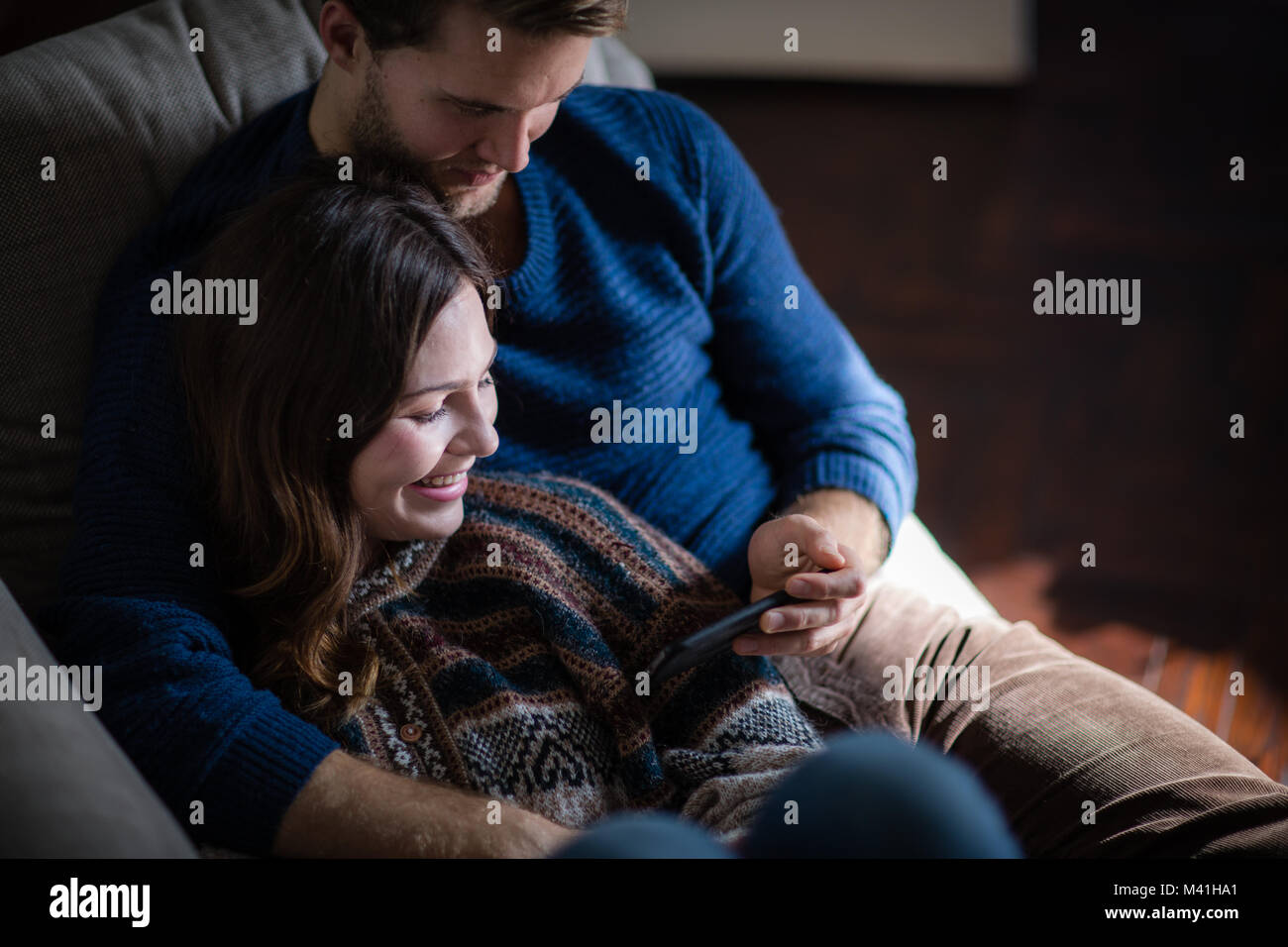 Man woman couple watching video hi-res stock photography and images - Alamy