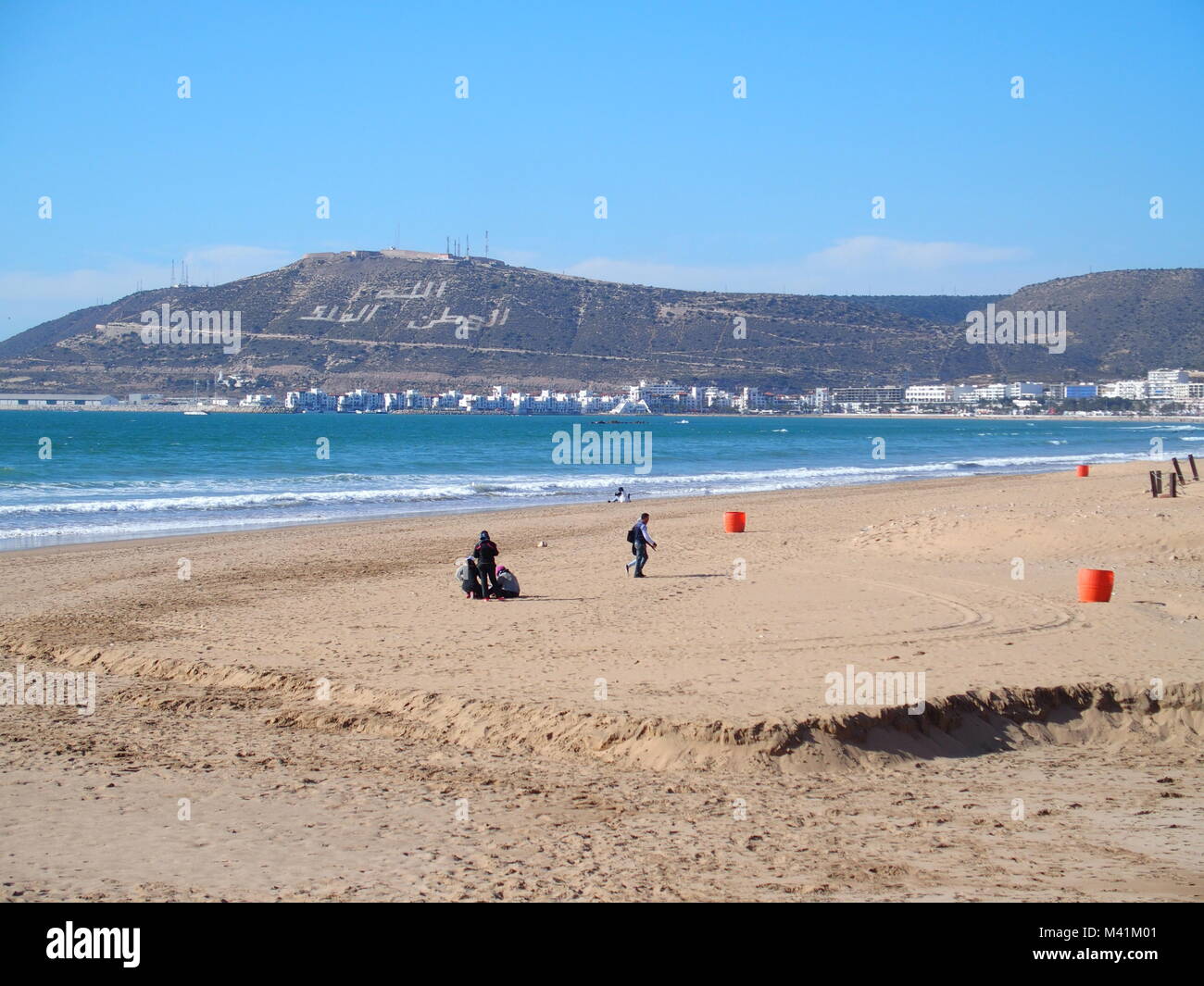 Sandy beach in travel AGADIR city in MOROCCO landscapes, clear blue sky ...