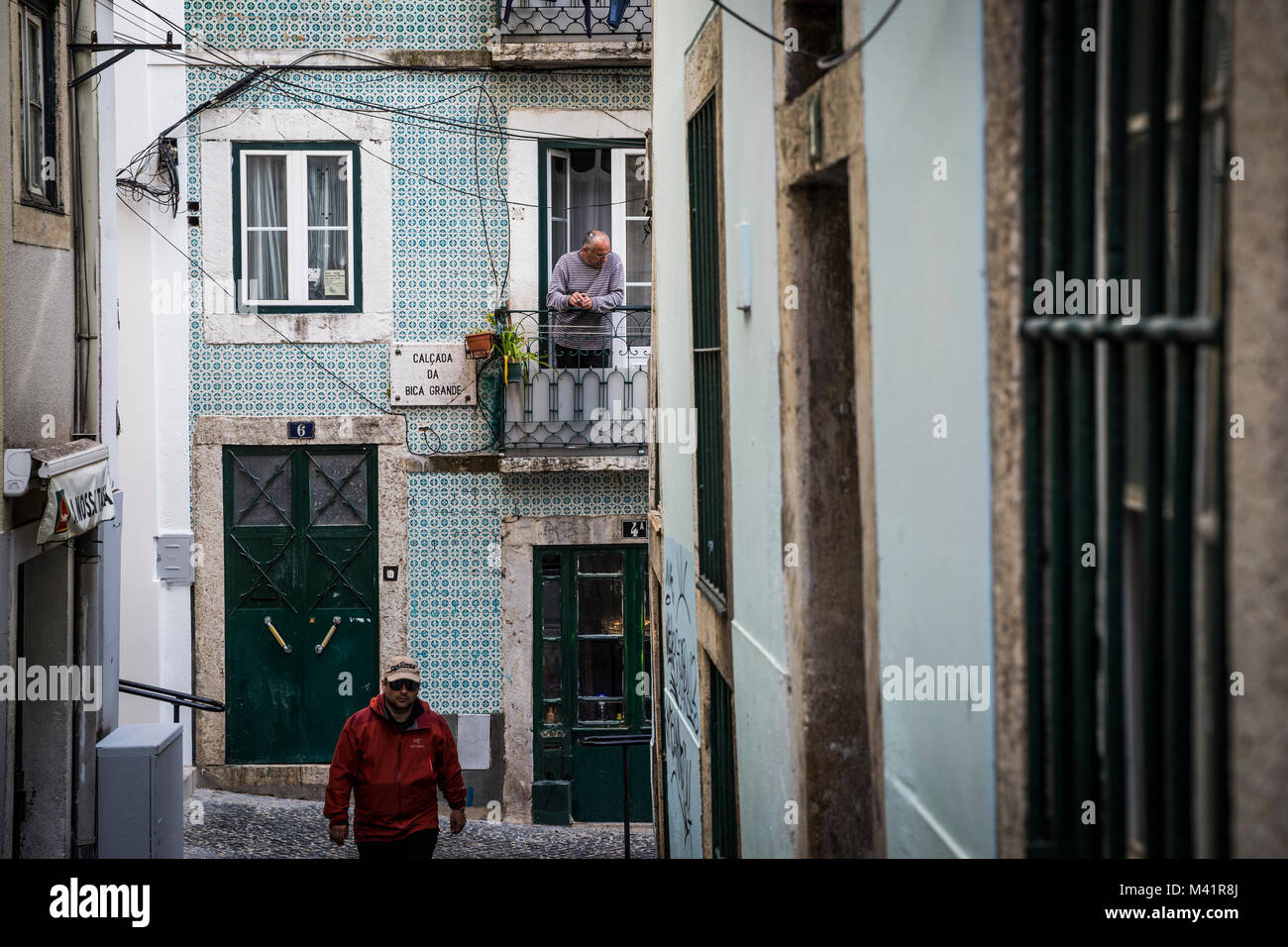 A man smoking on his balcony in Lisbon, Portugal Stock Photo - Alamy