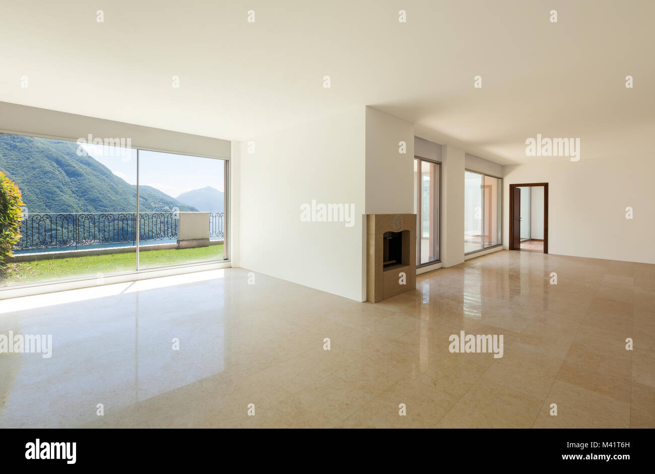 Interior apartment with garden, large room with fireplace Stock Photo ...