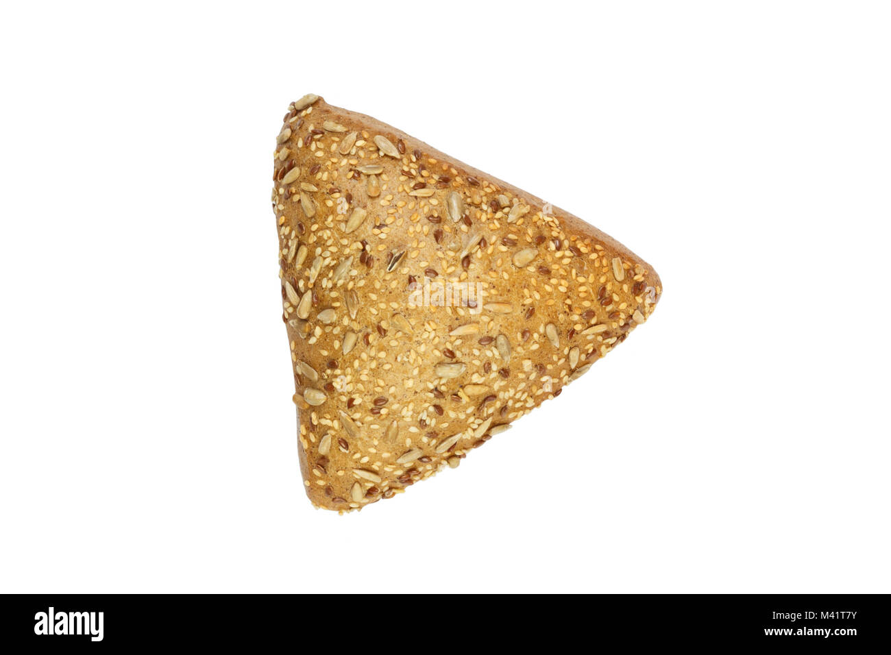 Rye triangle bun sprinkled with sunflower and flax seeds isolated on ...