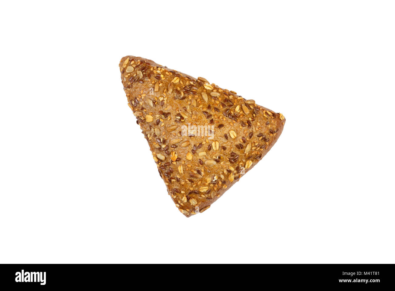 Rye triangle bun sprinkled with sunflower and flax seeds isolated on ...
