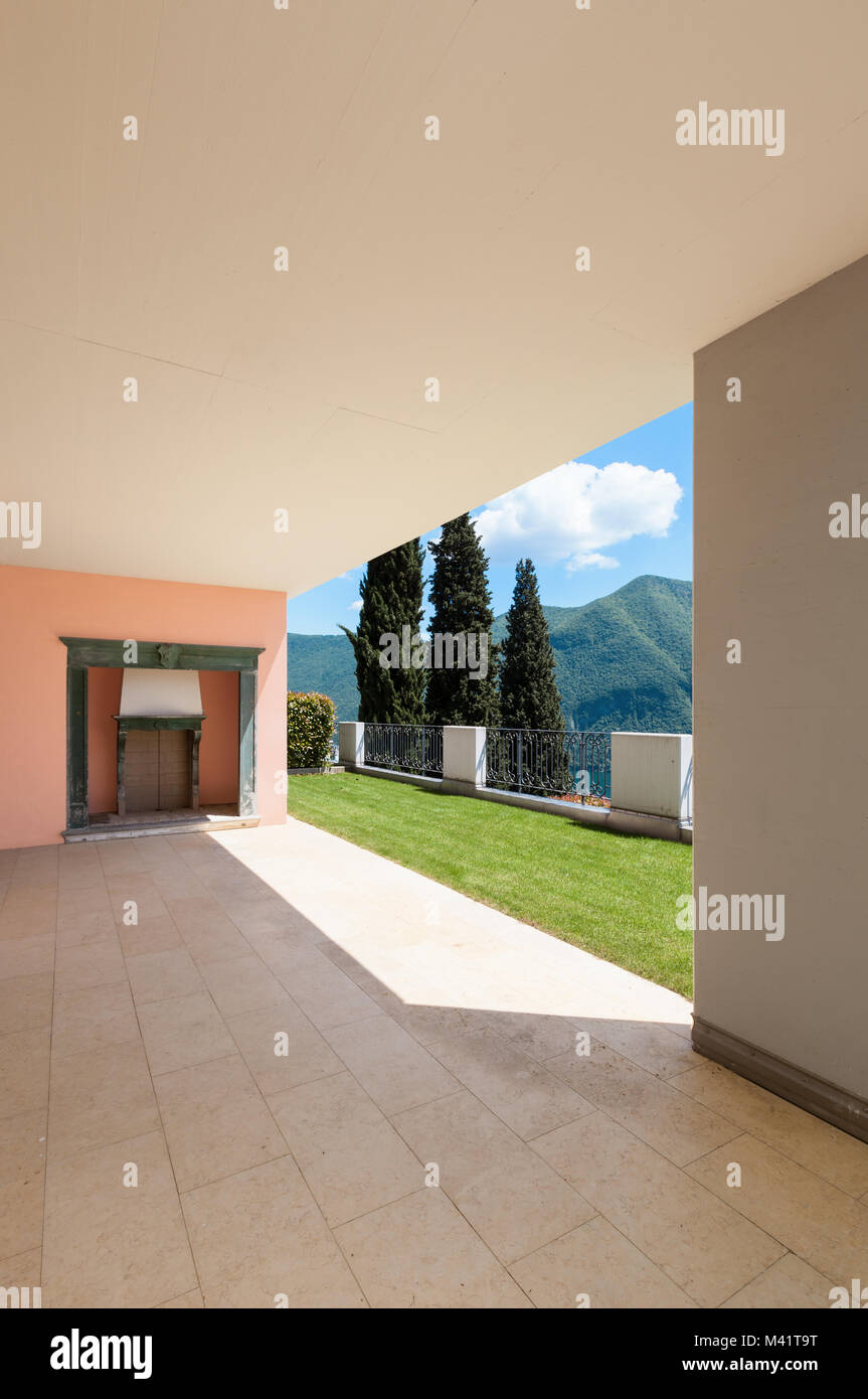 Interior apartment with garden, view from veranda Stock Photo - Alamy