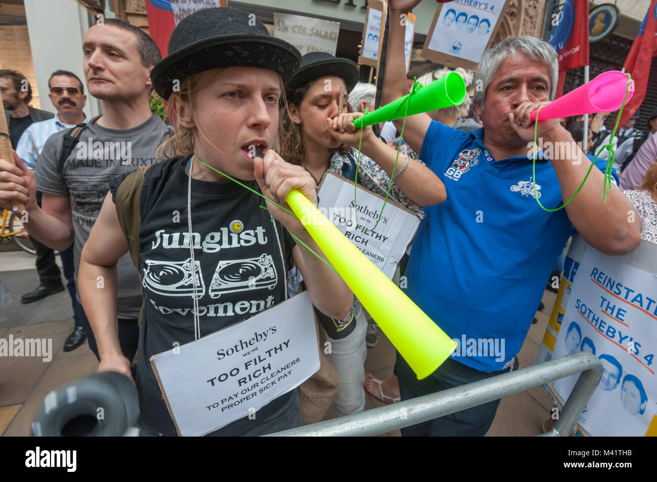 The protest continued peacefully on the pavement with people blowing ...