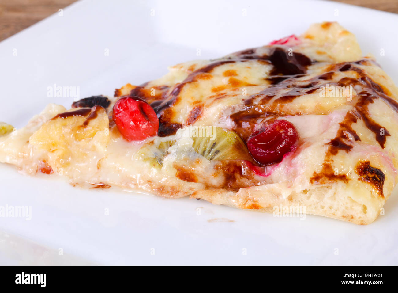 Sweet pizza with fruits and cheese Stock Photo - Alamy