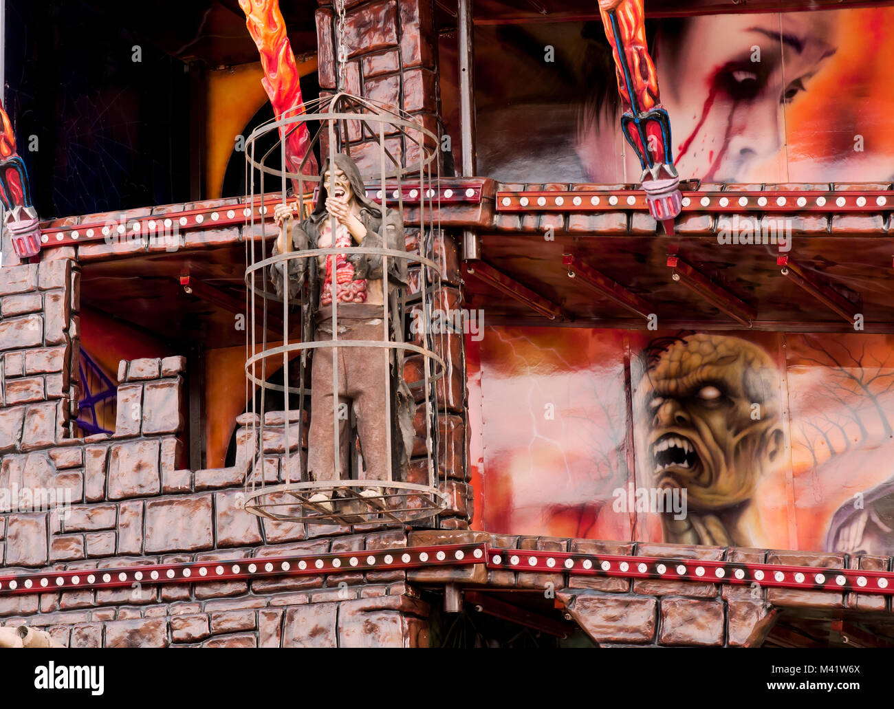 Monster plastic man inside an iron cage with all the visceras exposed ...