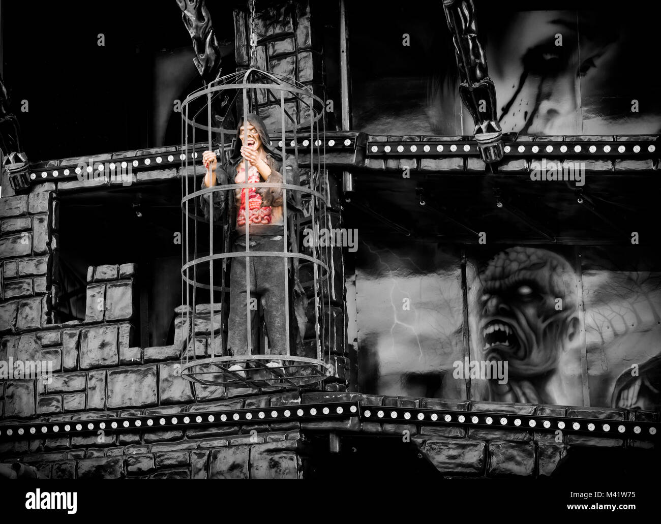 Monster plastic man inside an iron cage with all the visceras exposed ...