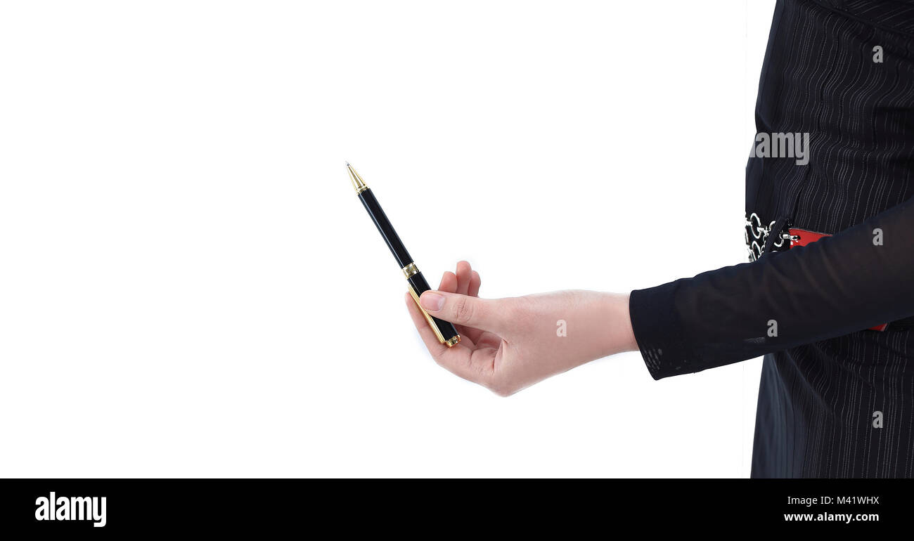 hand of business woman pointing with pen at a point on the blank screen ...